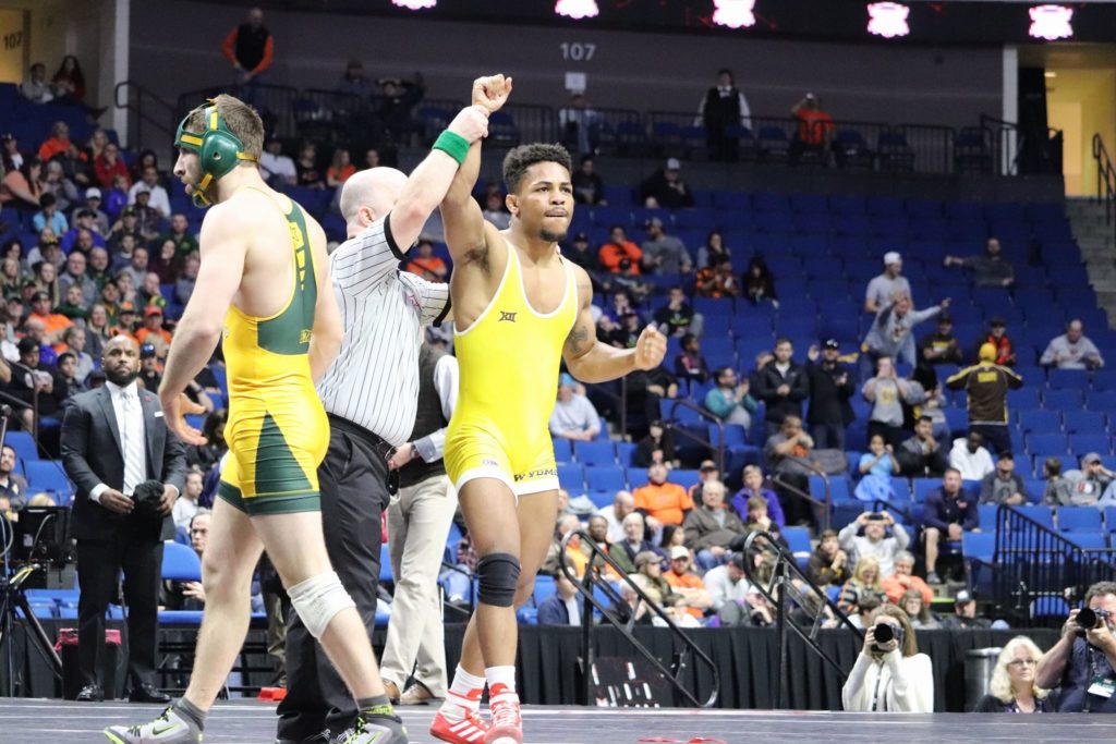 Cowboy wrestlers grab two Big 12 titles