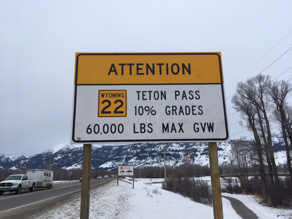 New signs will inform truckers earlier about Pass restrictions