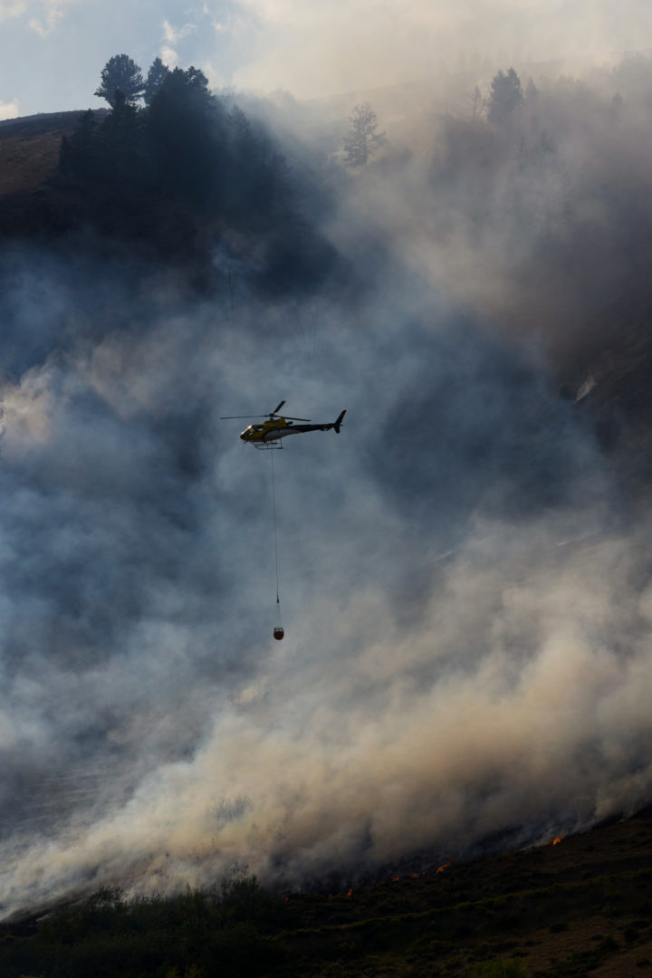 SNAPPED: Rescue crews hard at work during Saddle Butte fire