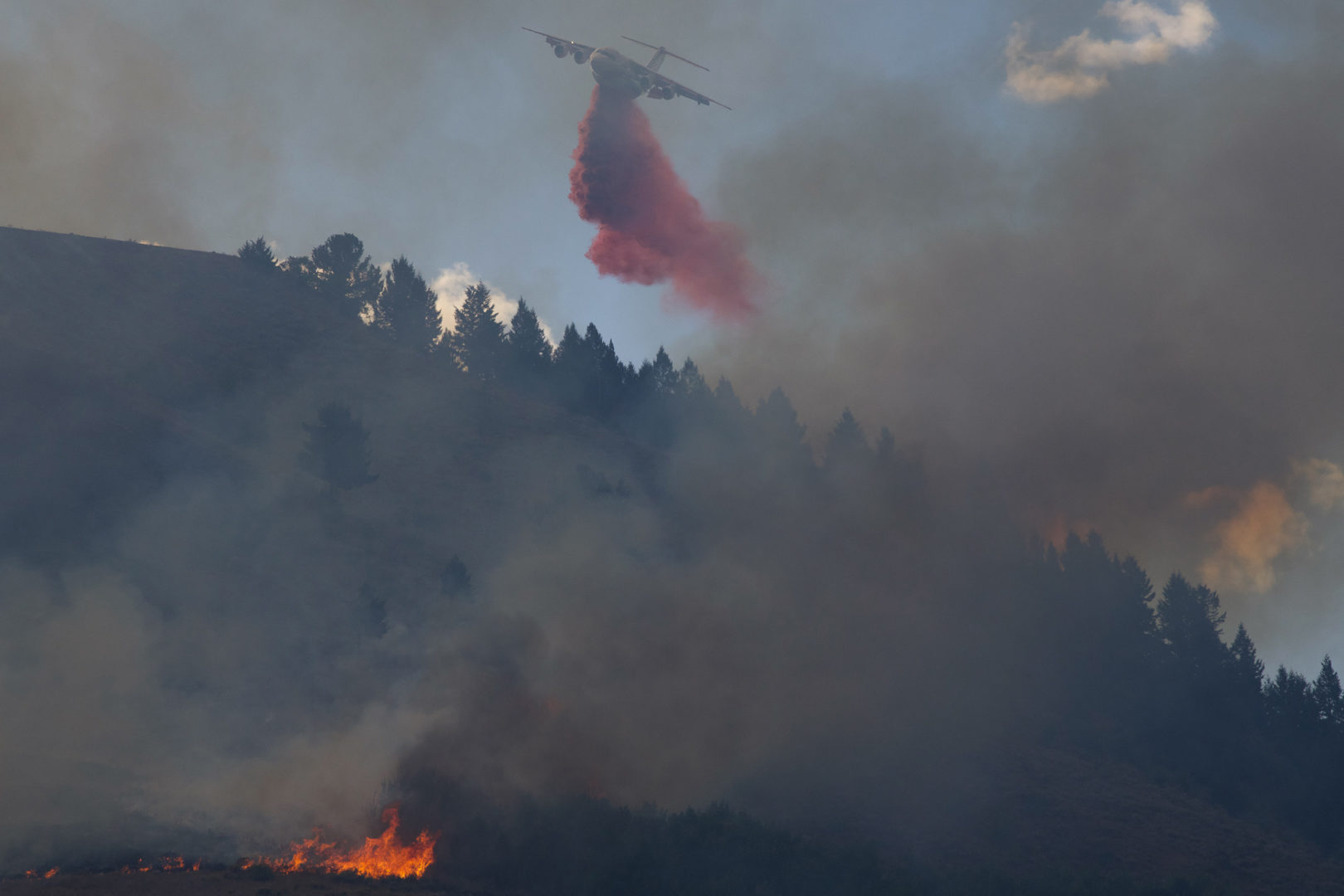 SNAPPED: Rescue crews hard at work during Saddle Butte fire